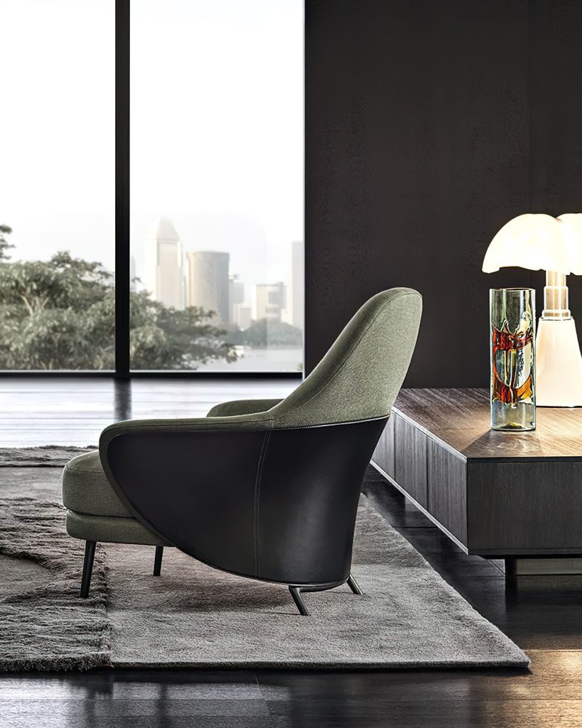 Angie Armchair is a Sculptural Gesture Shaping Functionality by Minotti ...