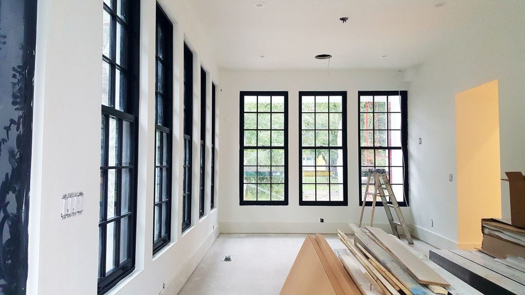 Modern Room Under Renovation with Large Windows – The Pinnacle List