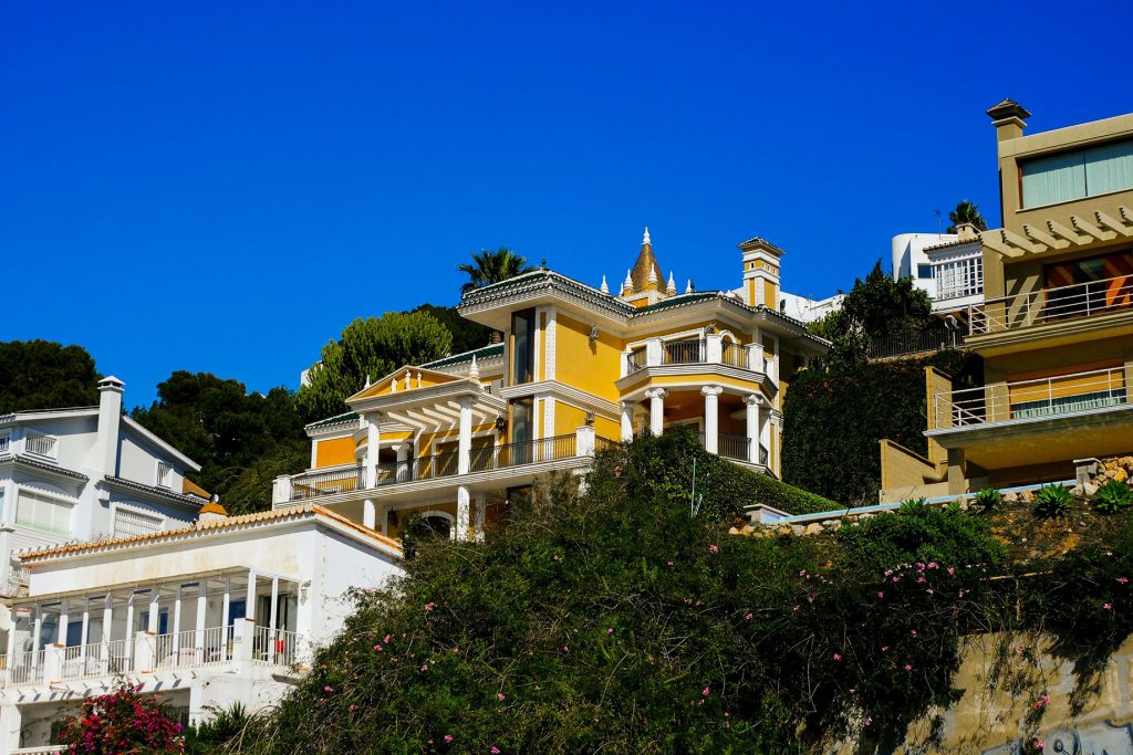 Row of Elegant Houses on a Hillside – The Pinnacle List